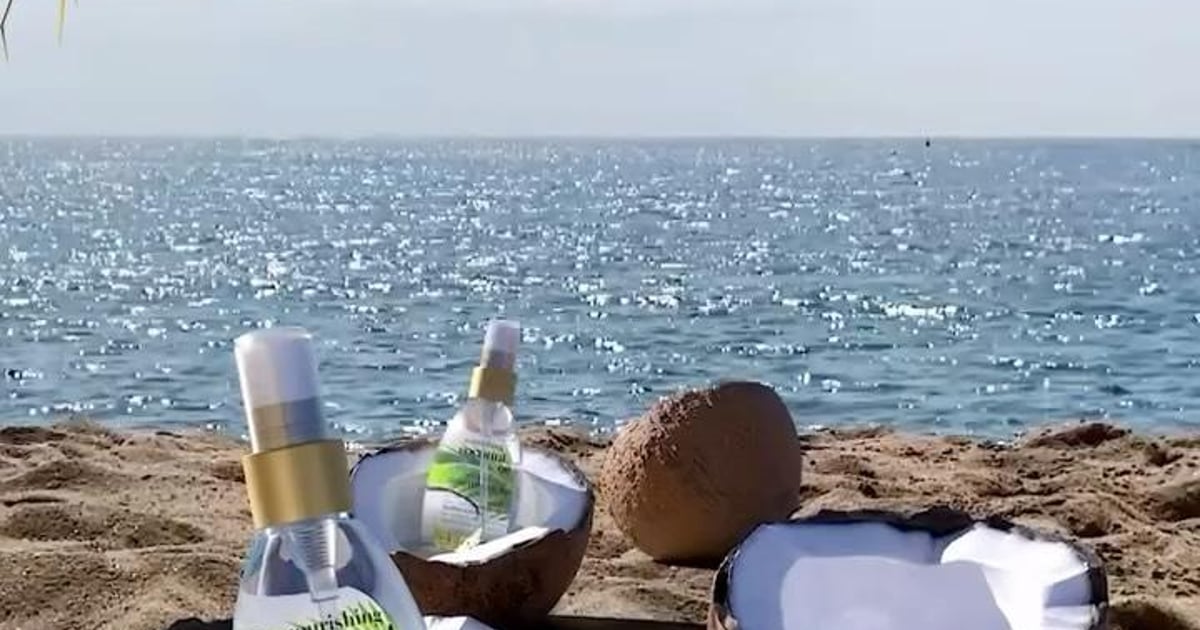 FOOH Ad OGX Coconut Reveals Oil Bottle on Beach