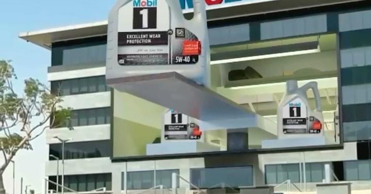 CGI Video Mobil Building Facade Opens for Giant Oil Bottles