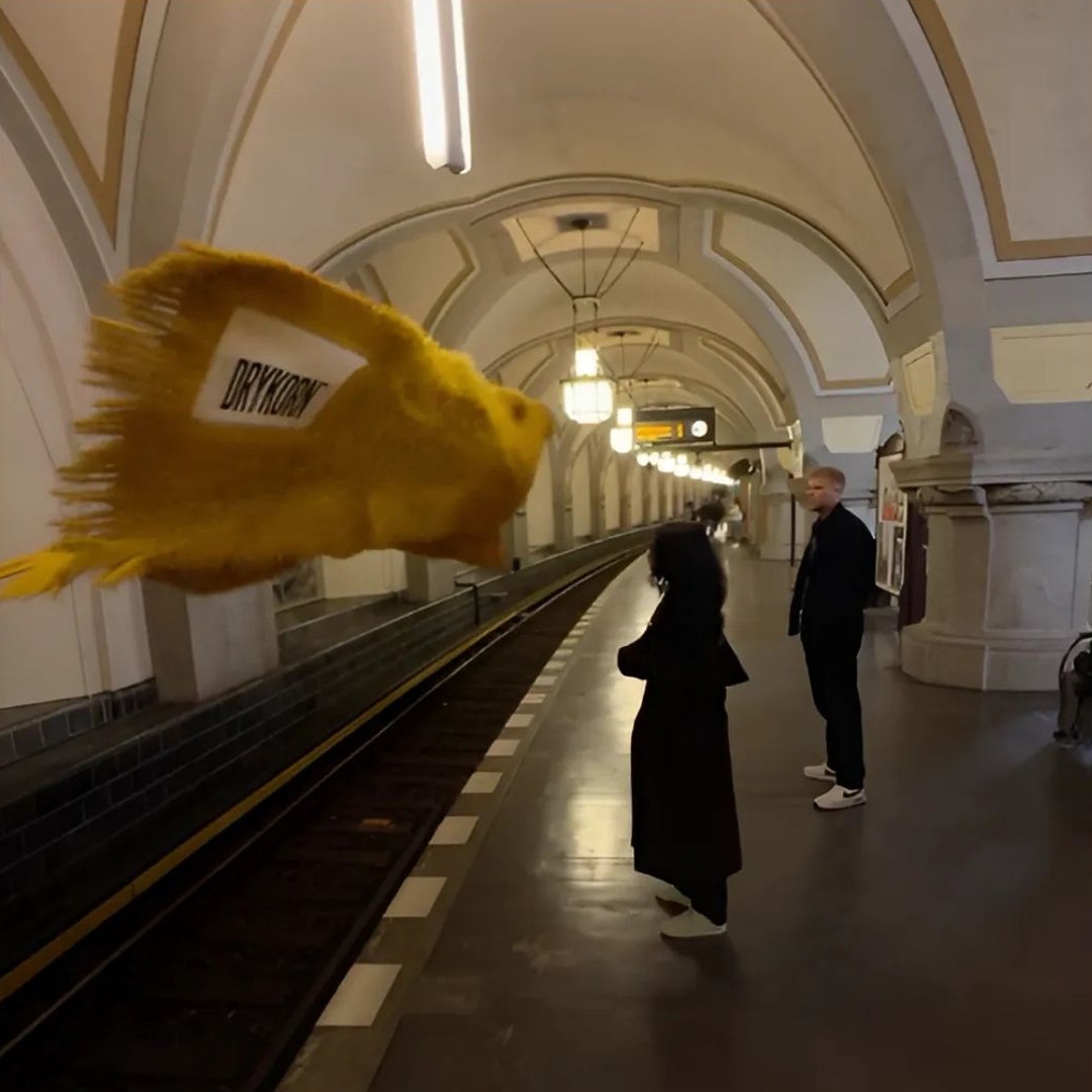 FOOH Ad Drykorn Scarf Flies Above Train Tracks